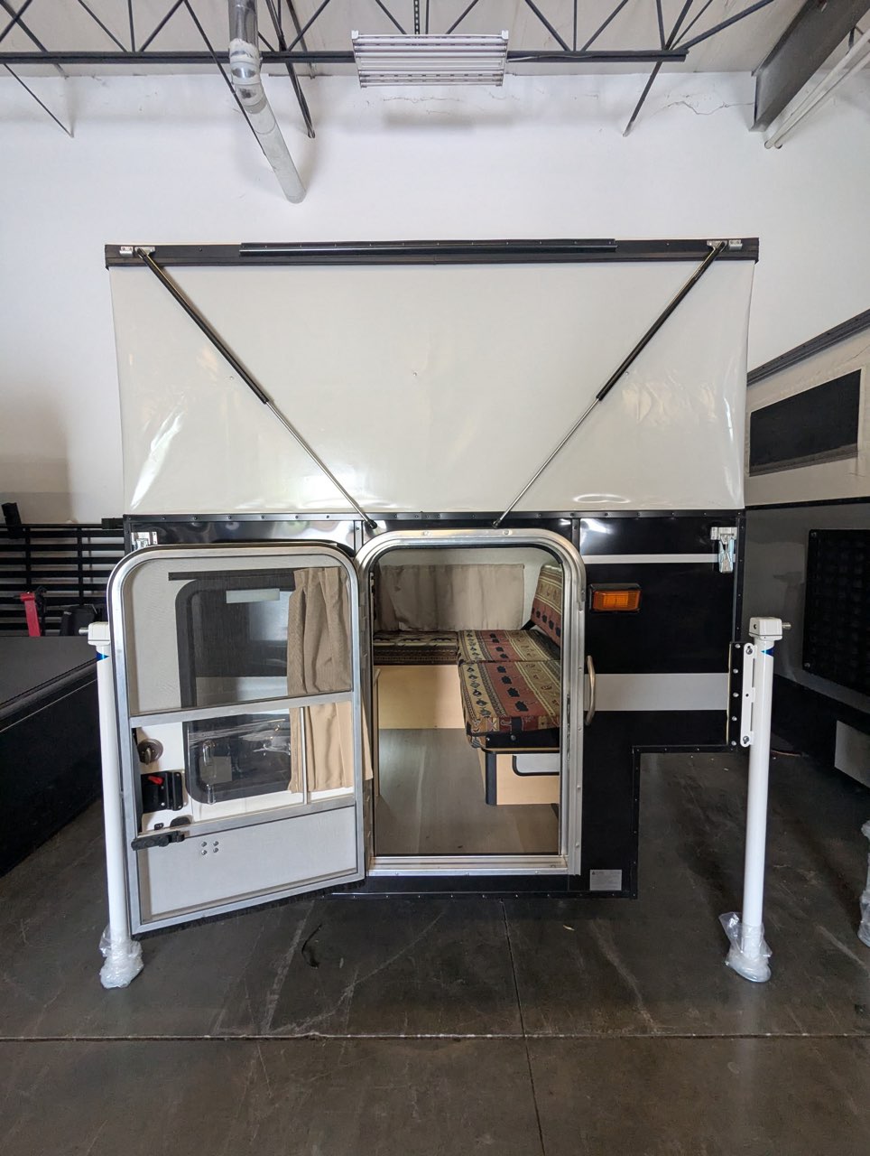 In-Stock Showroom FWC Inventory: 2025 Swift Camper with Rollover Couch ...